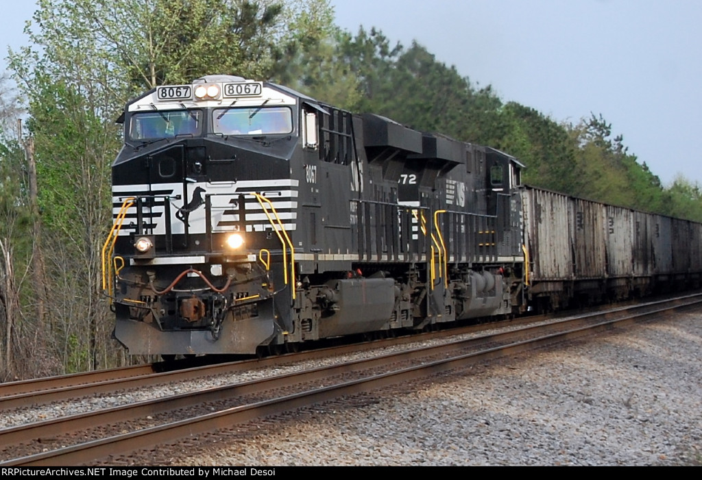 NE ES-44AC #8067+1 is head out on a westbound empty hopper train at Walnut Hill Rd.